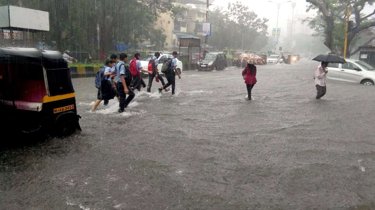 Mumbai Rains: Trains and buses disrupted, showers overwhelm city
