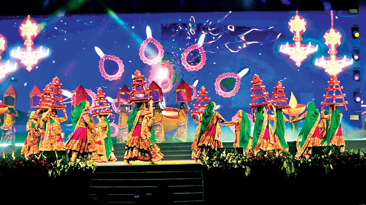 Day 1: Rain relents, but garba venues puddled