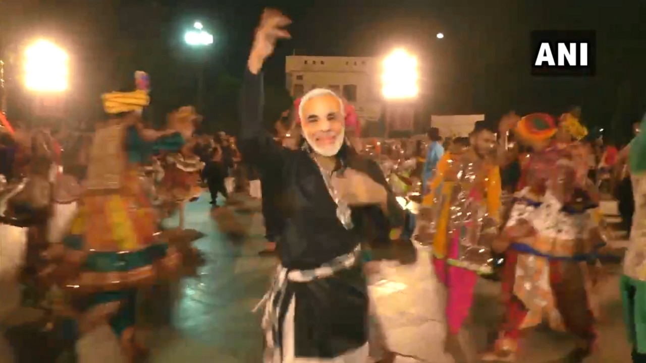 Watch: People wear Modi masks while performing 'Garba' in Surat