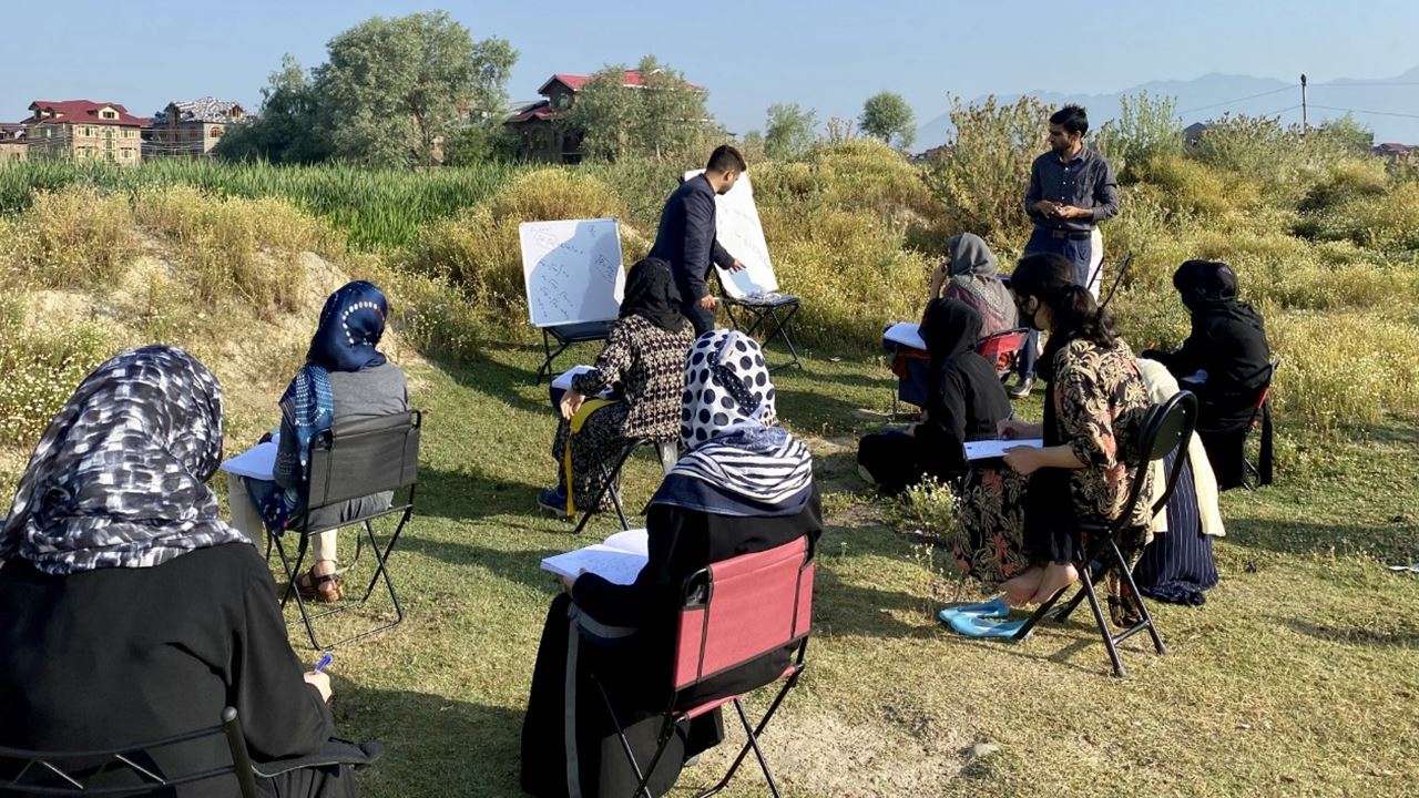 A free open-air class in Kashmir which depends on sun, rain and clouds