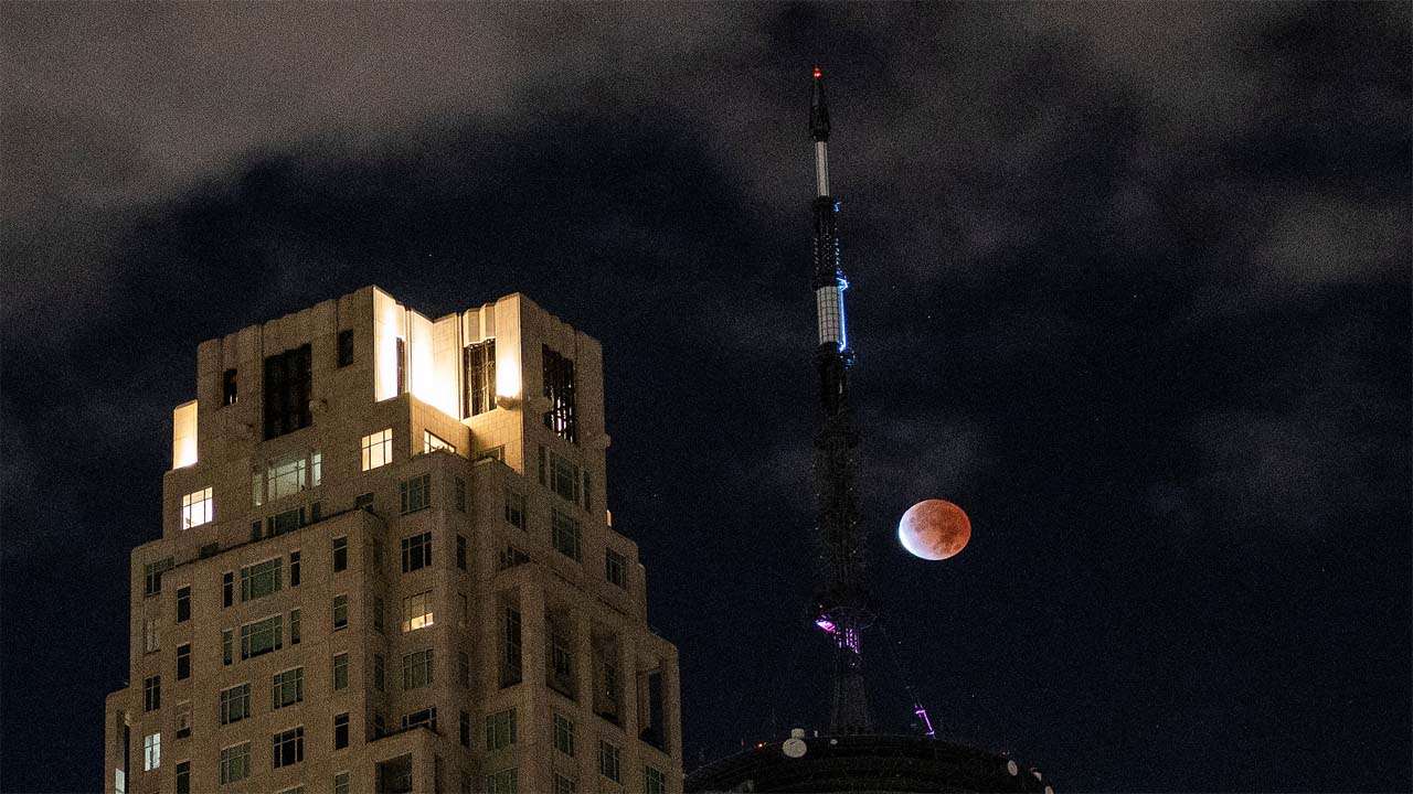 Partial lunar Eclipse 2021: Spectacular view of 'Blood Moon' from parts ...