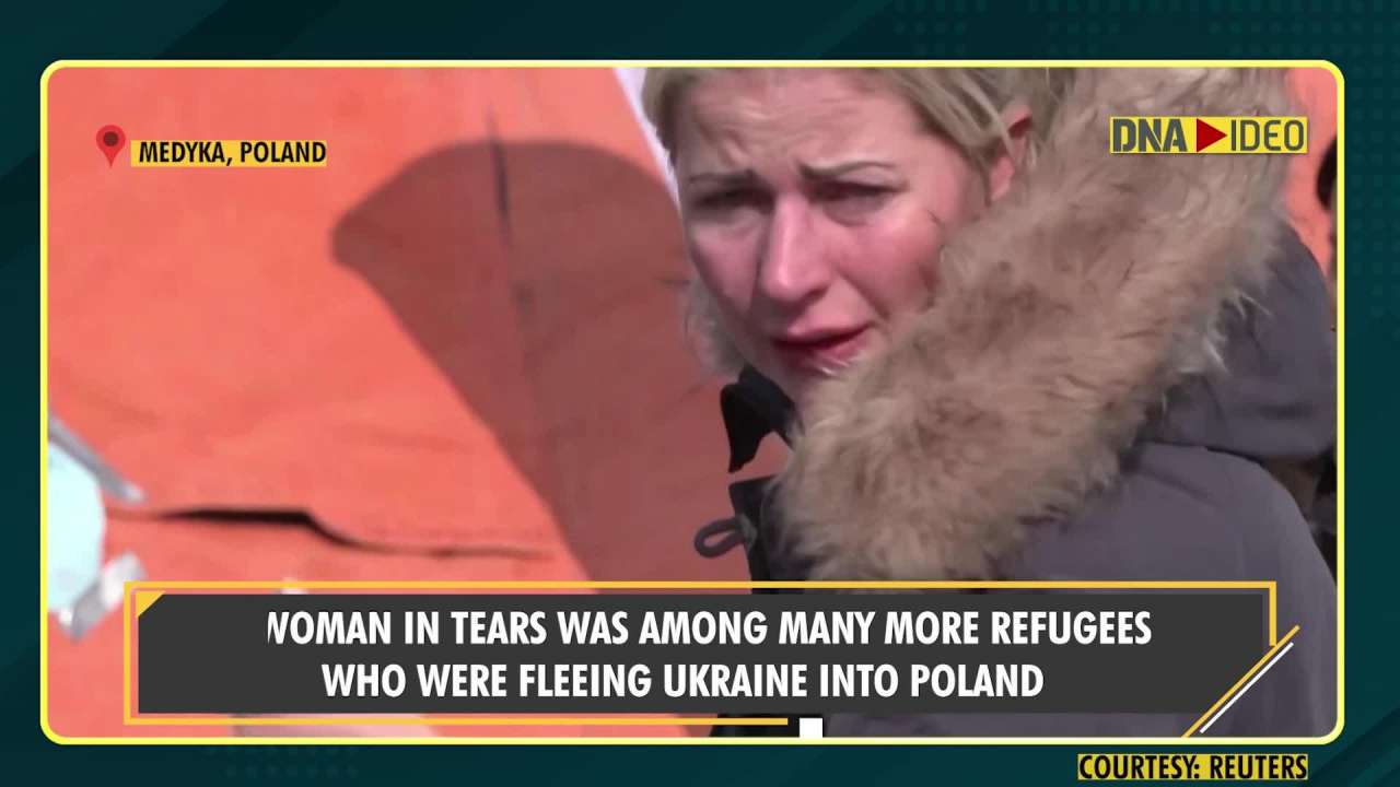 Emotional Moment: Ukrainian refugee in tears waiting for bus at Polish ...