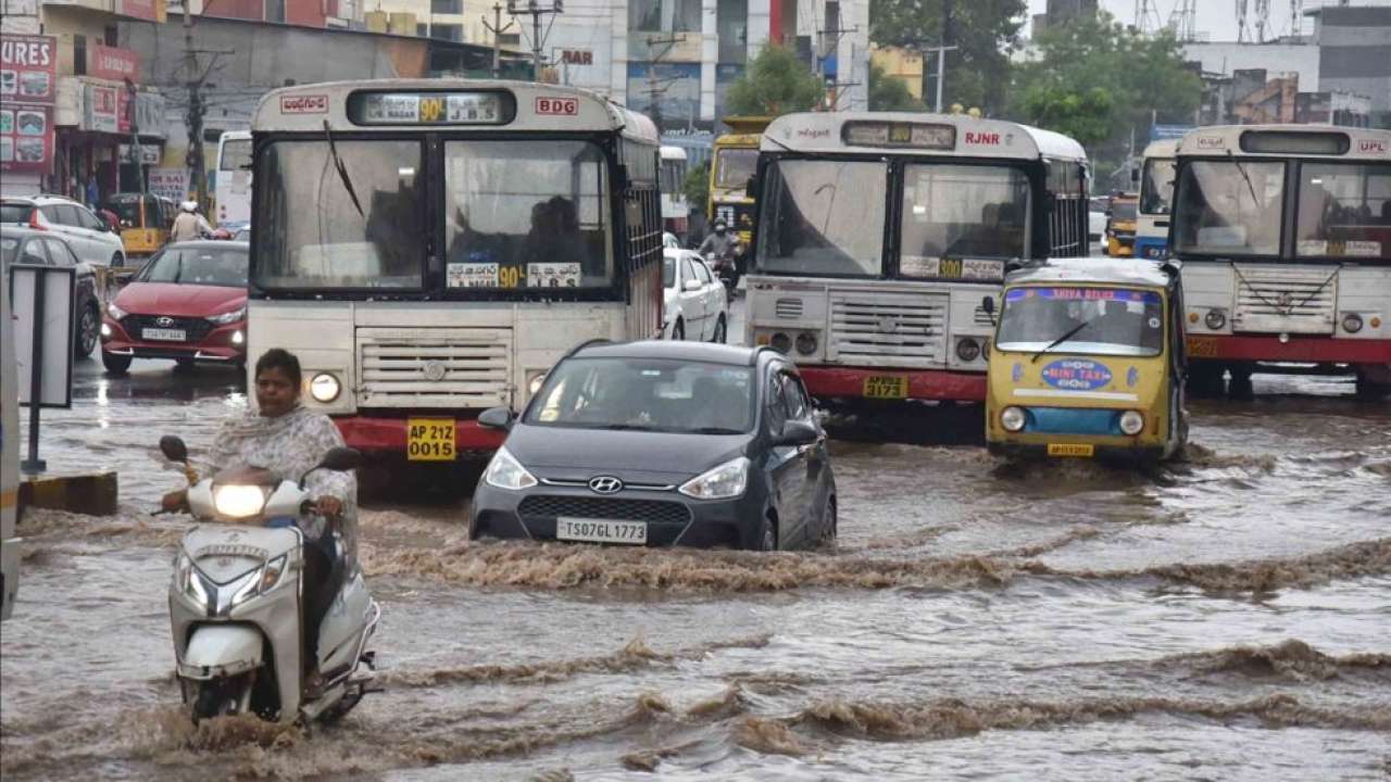 In pics: Heavy rain triggered by sudden cloudburst inundates parts of ...