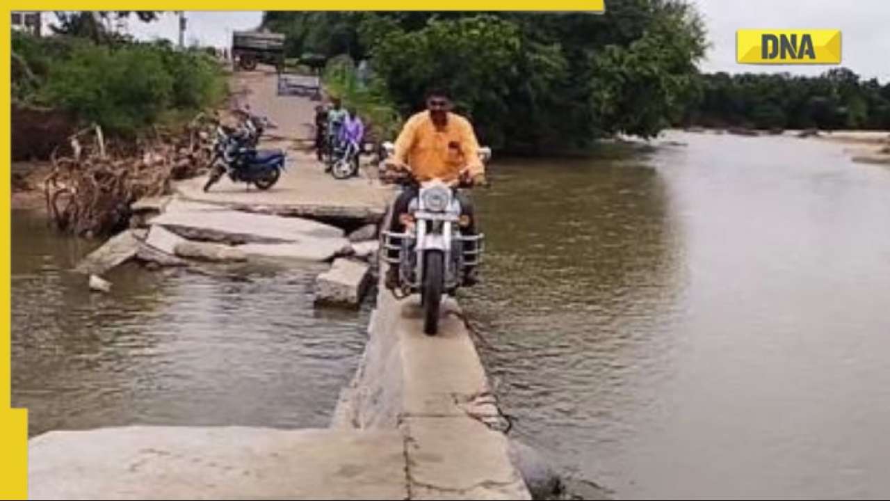 Viral Video: Man rides Royal Enfield over a broken bridge, leaves ...