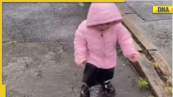 'Can't stop watching this...': Video of little girl playing in puddle ...