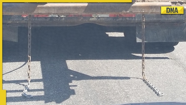 Why do trucks and buses have chains hanging at the back