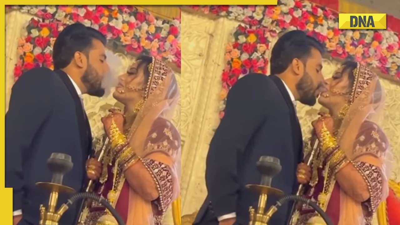 Viral video: Bride gives smoky kiss to groom while doing hookah, netizens say 'yahi dekhna rah ...