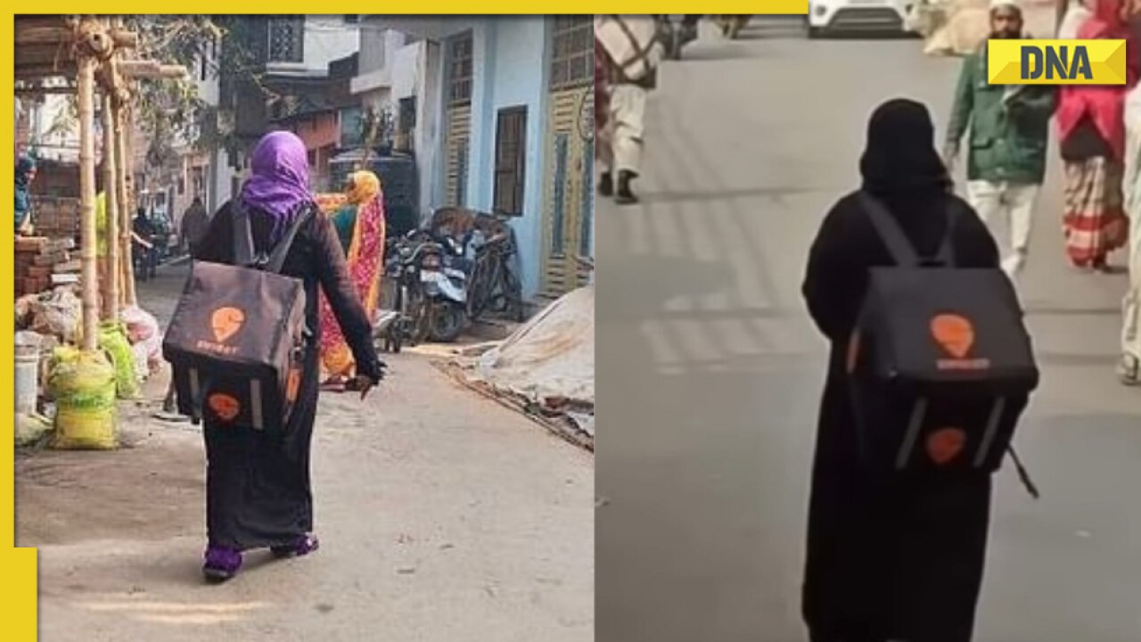 40-year-old burqa-clad woman walking with Swiggy backpack in Lucknow ...