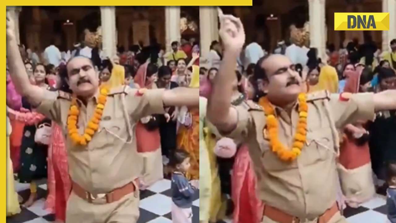 UP cop with pure devotion dances to Krishna's bhajan at temple, viral ...