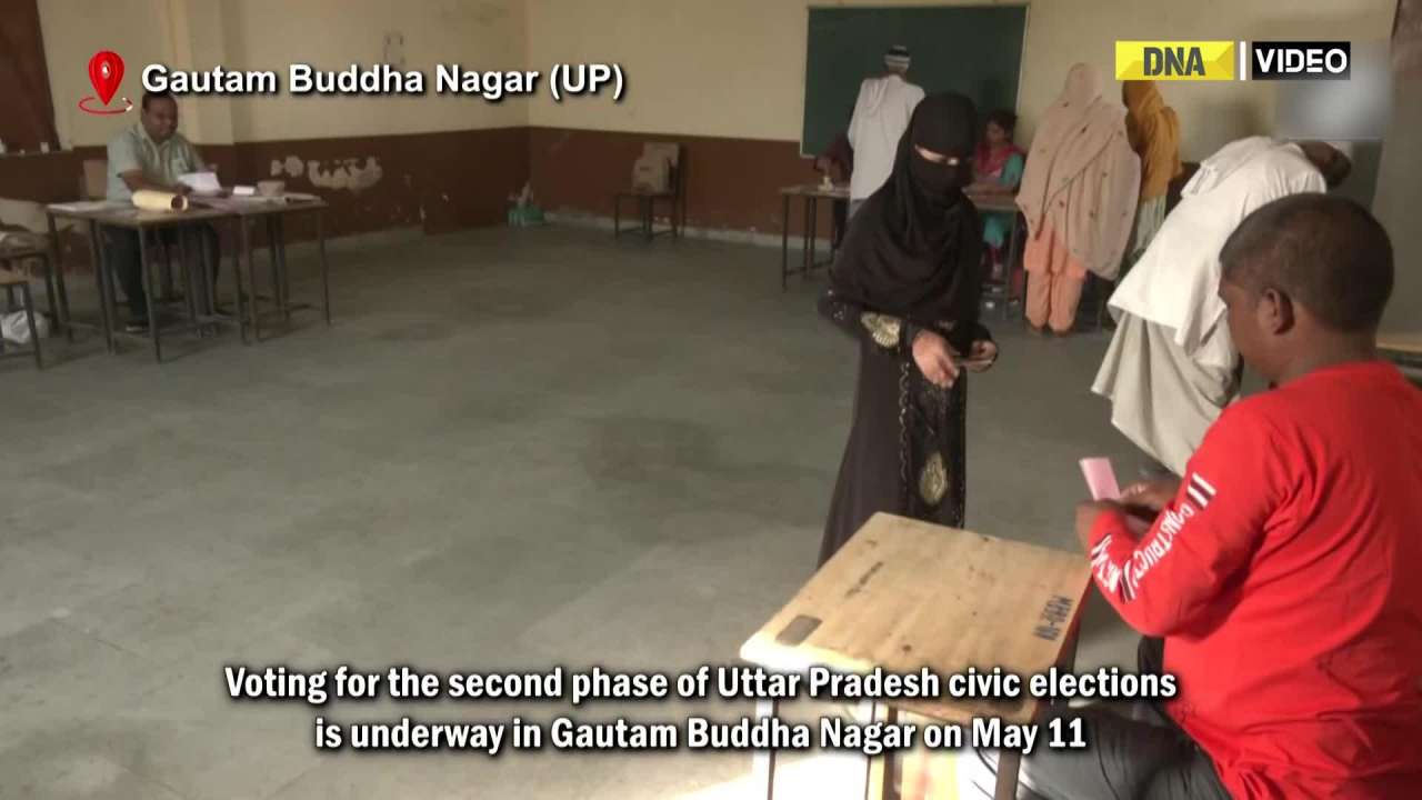 UP Civic Polls: Voters lined up outside polling booth in GB Nagar to ...