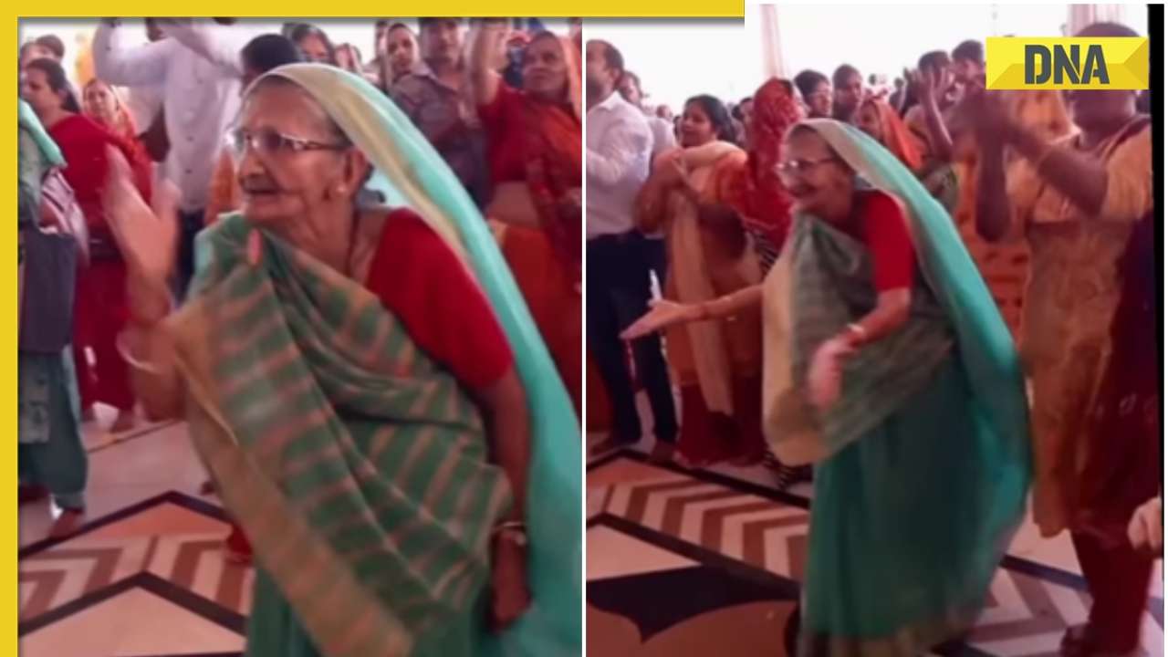 Elderly woman with pure devotion dances to Krishna's bhajan at temple ...