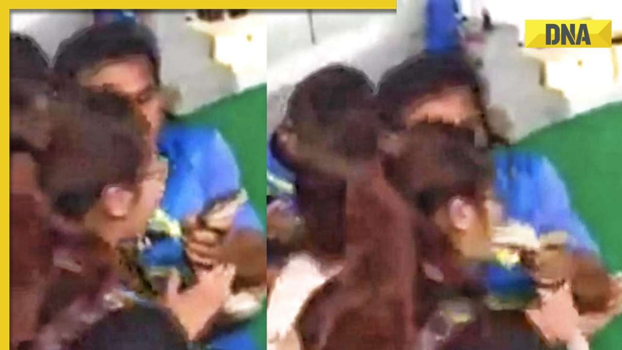 Viral video: Woman gets bitten in face while trying to kiss massive snake, watch