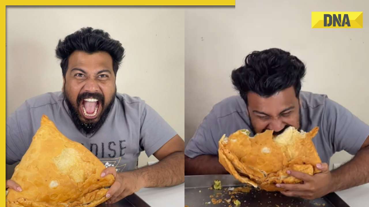 Viral video: Man tries to eat gigantic 5kg samosa, internet calls him ...