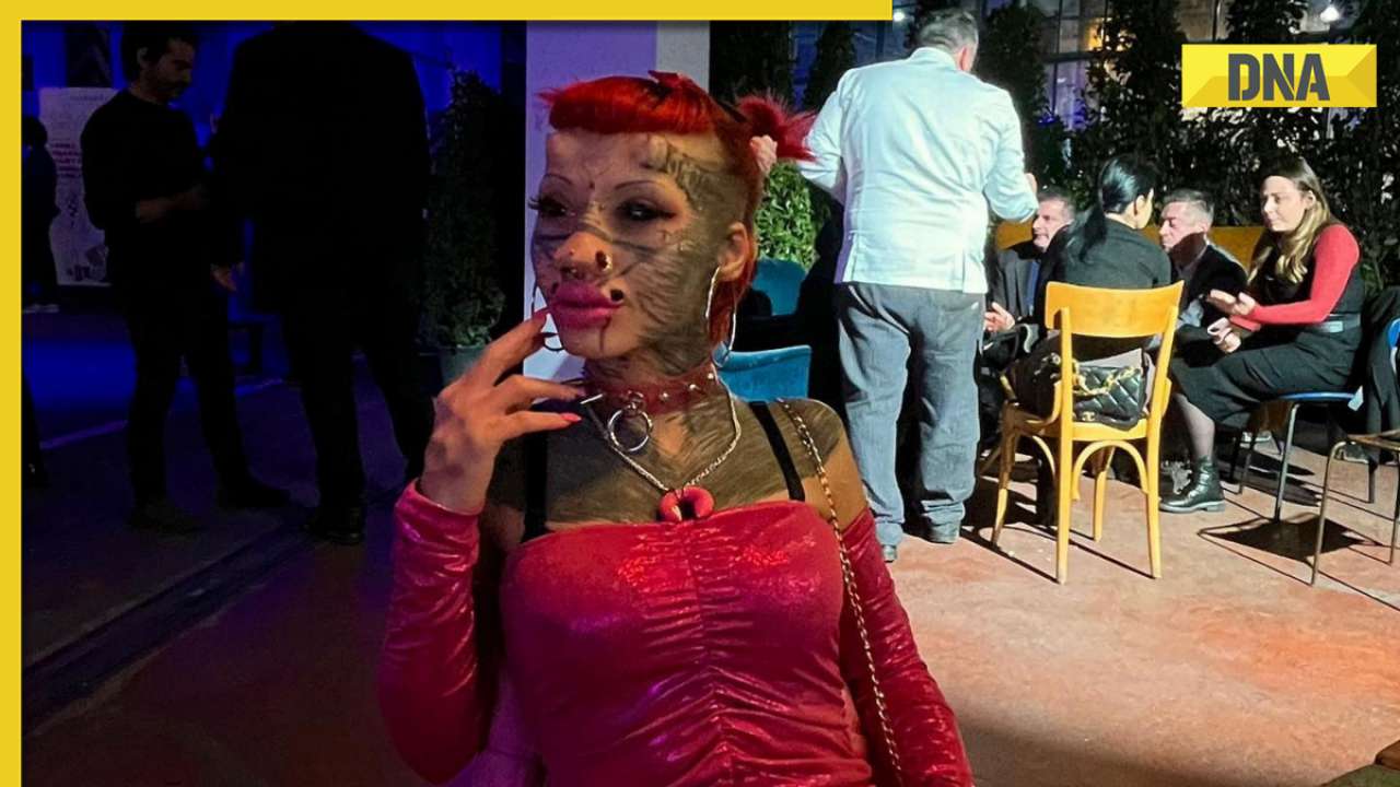 Italian woman undergoes multiple body modifications to transform into a ...