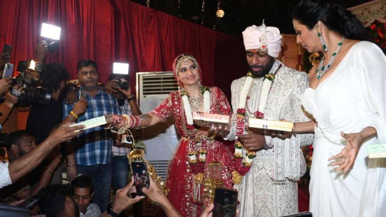 In pics: Arti Singh stuns in red lehenga as she ties the knot with beau ...