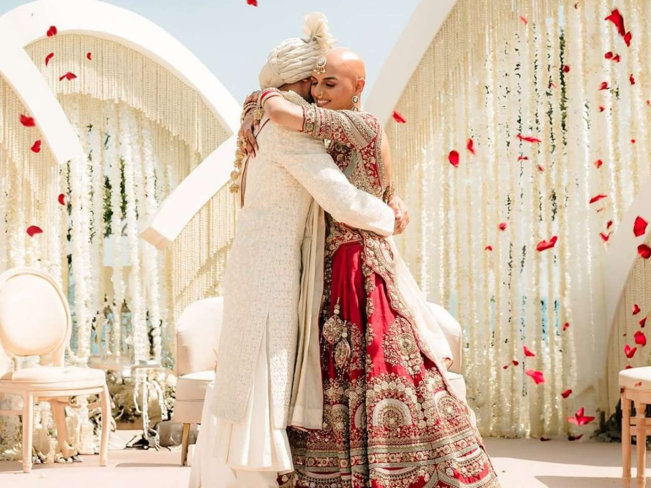 In Pics: Indian bride flaunts her baldness in beautiful red lehenga