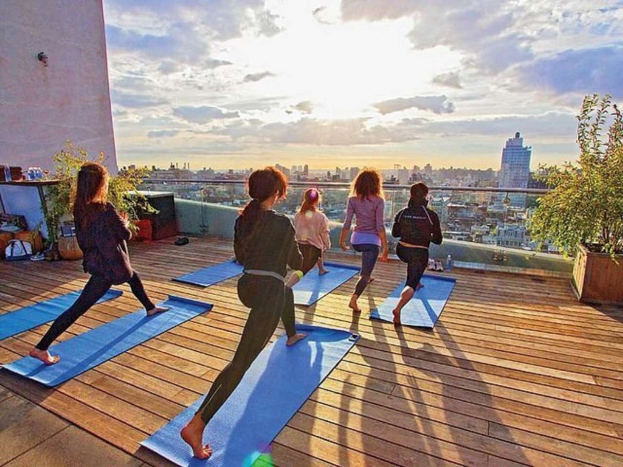 From rooftop yoga to aerial yoga: 5 'hottest' yoga trends that are ...
