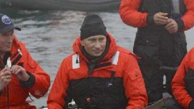 Russian PM Vladimir Putin braves rough seas to study whales