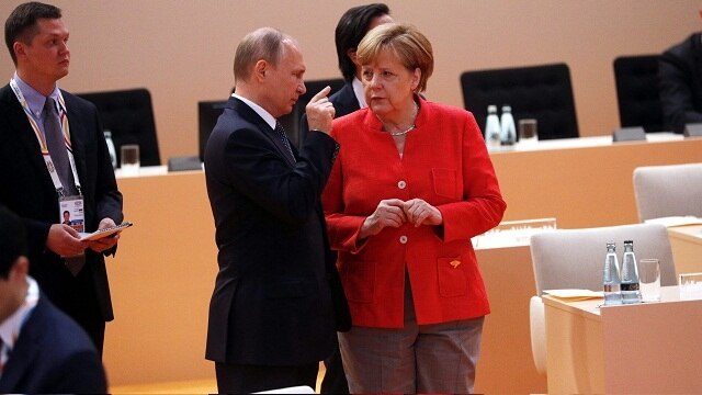 Watch: Merkel 'eye-rolling' at Putin takes social media by storm