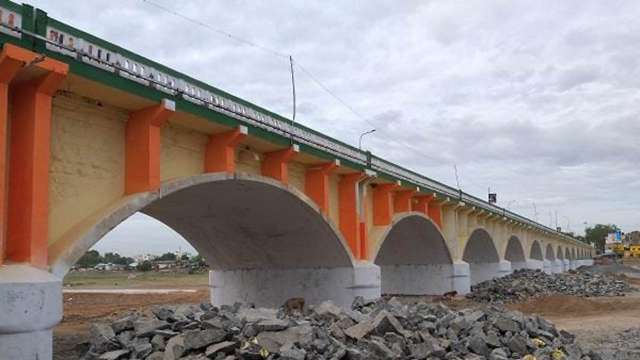 Like BJP flag: DMK MLA P Thiaga Rajan sees red over Madurai bridge's ...
