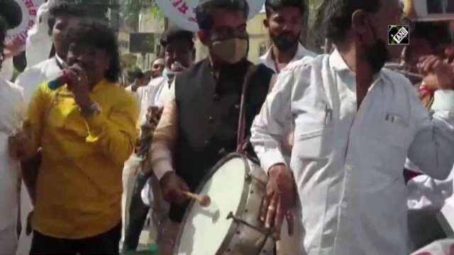 Watch: MP Shankar Lalwani passionately plays band with musicians in Indore