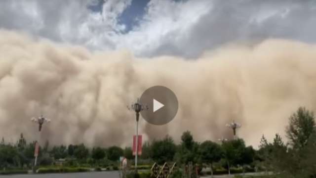 The Great Wall of Sand: Sandstorm engulfs ancient city of Dunhuang in ...